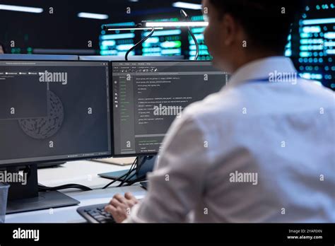 Programmer In Server Farm Checking Recovery Plan Monitoring Data