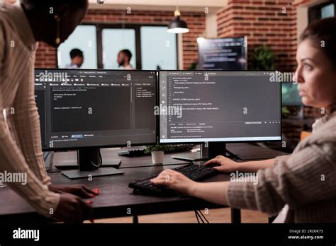 Diverse Programming Engineers Developing Html Code And Cloud Computing In It Development Agency