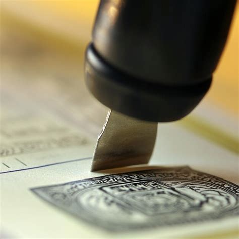 A Closeup Of A Work Permit Being Stamped Or Approved By Immigration
