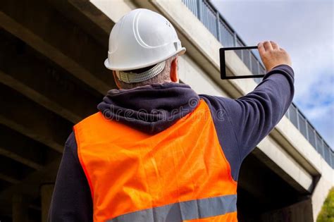 Engineer Filmed With Tablet Pc Damaged Bridge Stock Image Image Of