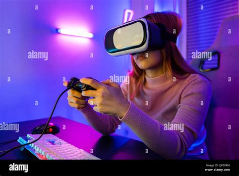 Gamer In Vr Headset Glasses Exploring Metaverse Play Video Game Online