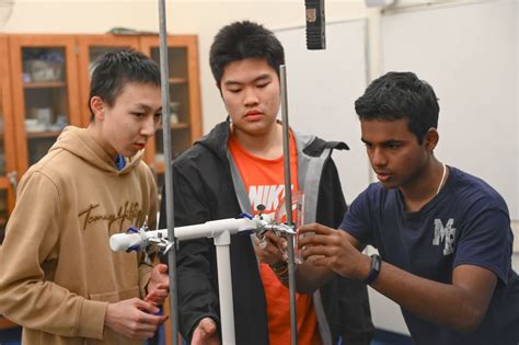 AP Physics Class Uses Experimental Approaches To Determine Moment Of Inertia News Details