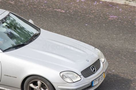 Silver Mercedes Benz Slk Class Kompressor Driving On Asphalt Road