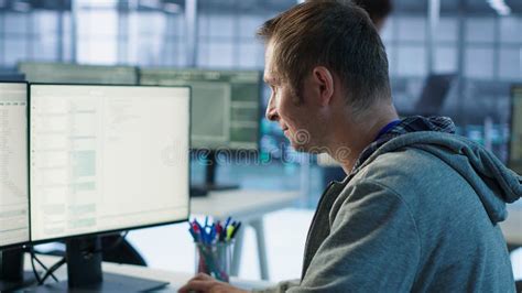 System Administrator In Server Room Doing System Analysis Coding Stock