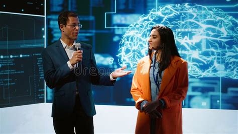 Cheerful Host And Expert Guest Talking At AI Summit Stock Image Image Of Summit Communication