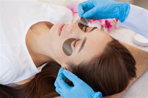 Close Up Of Young Woman Getting Spa Massage Treatment At Beauty Spa