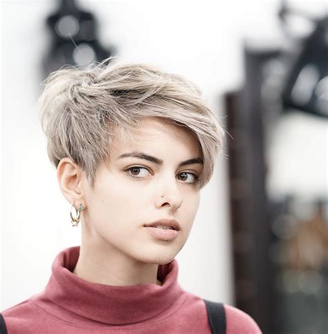 Messy Feathered Pixie With Side Swept Bangs The Latest Hairstyles For Men And Women