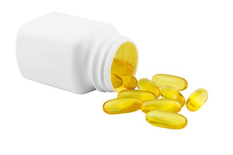 노란 캡슐 오메가 3 지방산 생선 기름과 병 흰색 배경에 고립 된 컨테이너 0명에 대한 스톡 사진 및 기타 이미지 0명 건강관리와 의술 건강한 생활방식 Istock