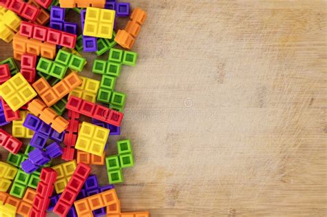 Colorful Interlocking Tower Blocks With Blank Space For Text On Wooden
