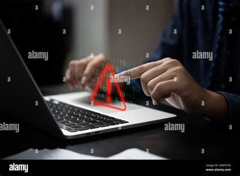 Businessman Programmer Developer Using Laptop Computer With Triangle Caution Warning Sign For