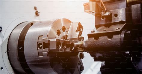 태핑용 드릴 비트가 있는 드릴링 머신 사진 Unsplash의 씨엔씨 기계 이미지