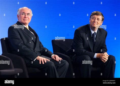 Australian Prime Minister John Howard Left And Microsoft Chairman