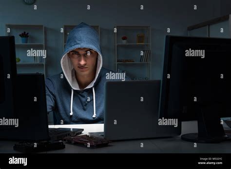 Hacker Hacking Computer At Night Stock Photo Alamy