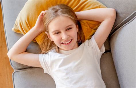 Preteen Girl Lying On Sofa And Posing Stock Image Image Of Pretty