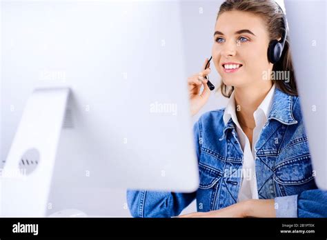 Female Technical Support Agent In Office Working On Computer Stock Photo Alamy