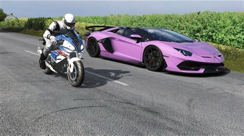 A Man Riding A Motorcycle Next To A Pink Sports Car