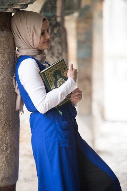 Premium Photo Young Muslim Girl Reading The Koran
