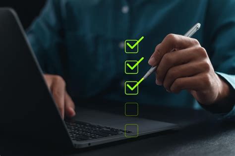 Premium Photo Businessman Using Laptop And Checking Mark On Checkboxes For Checklist Concept