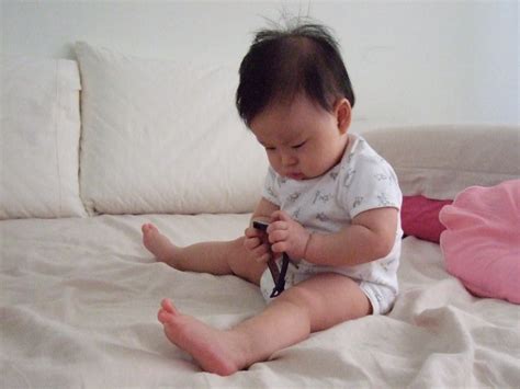 He S Got The Whole World In His Hands Playing With Daddy S Watch