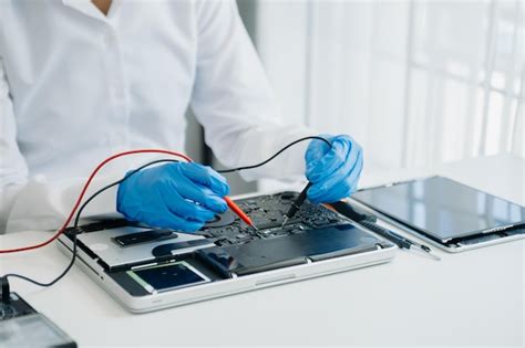 Premium Photo The Technician Is Putting The CPU On The Socket Of The Computer Motherboard
