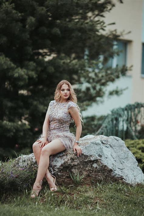 Vertical Shot Of A Beautiful Bosnian Caucasian Woman Wearing A Formal