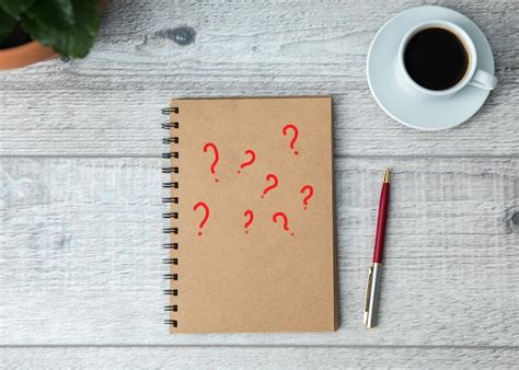 Premium Photo Question Mark On Notepad