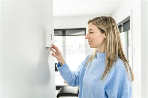 Woman Set The Thermostat At Home House Stock Image Image Of Saving Horizontal 320212087