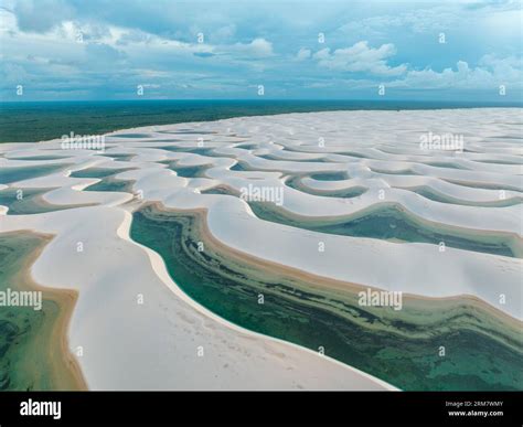 Aerial View Of Lencois Maranhenses White Sand Dunes With Pools Of