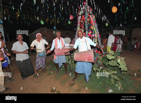Tribal Men Playing Musical Instruments During Karma Puja Festival