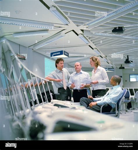 Business People Data Center Control Center Man Woman License Free Except Ads And Outdoor