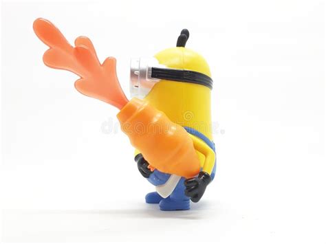 Yellow Banana Minion Toys Plastic Model From Despicable Me Movie In White Isolated Background