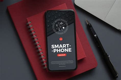 Smartphone Mockup Laid On Notebook In Top View Free Download Resource Babe
