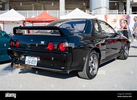 Rear View Of A Black Eighth Generation Nissan Skyline Gt R32 At A