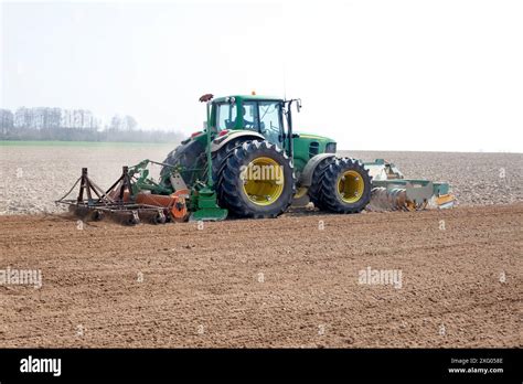 Passage Of An Implement Train Before Seeding In Light Soils In Normandy France Stock Photo Alamy