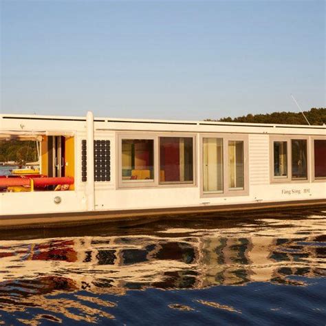 Crossboundaries Converts Houseboat Into Tiny Solar Powered Home Binke Lenhardt