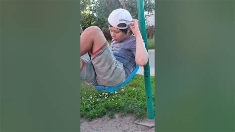 Мальчик аутист разговаривает на своём языке и качается на качеле - YouTube