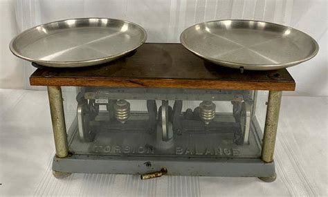 The Torsion Balance Scale