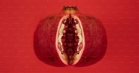 A Pomegranate Cut In Half On A Red Background Photo Sex Image On Unsplash
