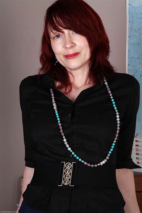 Redhead Mature Teacher Undressing And Exposing Her Goods In The