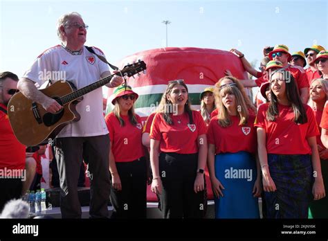 Welsh Singer Dafydd Iwan Performs With A Choir At The Corniche Walk Park Qatar Ahead Of Wales