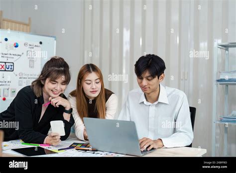 Young Creative Team Collaboration On Ux Ui Design Project In Modern Office Environment With