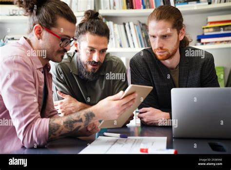 Mixed Team Of Software Engineers Brainstorming Ideas Diverse App