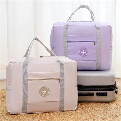 넉넉한 수납 실용적인 포켓 여행용 가방 보스턴백 온채널