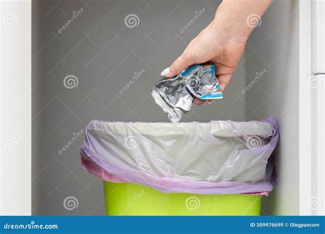 Man Throwing Plastic Packaging Into Trash Bin At Home Stock Image Image Of Person Garbage