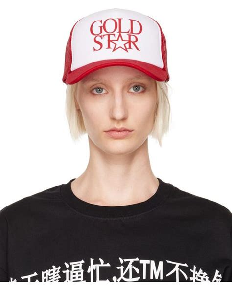 Praying Star Cap In Blue Lyst Uk