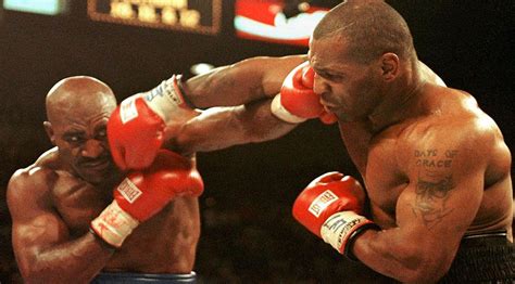 11 Amazing Photos Of Mike Tysons Most Iconic Fights Muscle And Fitness