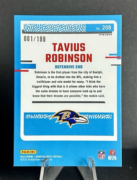 Tavius Robinson 2023 Panini Donruss Optic Rated Rookie Blue Holo 199