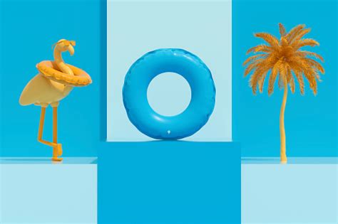 선글라스를 끼고 있는 풍선 플라밍고와 연단에 있는 수영 반지 최소한의 여름 여행 휴가 배경 플라스틱 플라밍고에 대한 스톡 사진