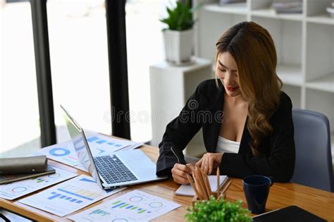 Image Of Professional Female Analyst Writing Notes In Personal Daily