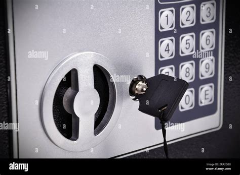 Key Is Inserted In Lock Of Safe Stock Photo Alamy
